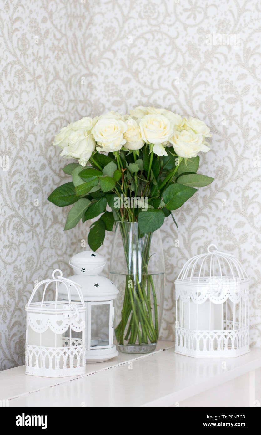Bouquet of white roses in a vase. White roses and decorative cells ...