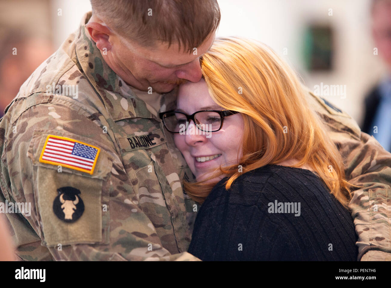 Master Sgt. Anthony Ballone hugs his daughter Rylee Tate, at a welcome ...
