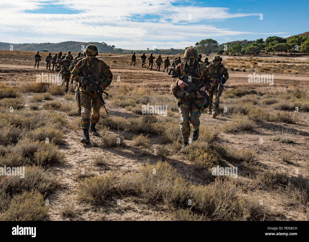 Belgian commando soldiers approach to load into a CH-47F Chinook ...