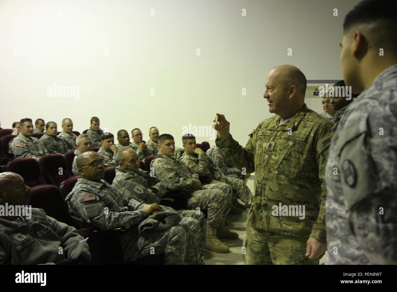 Army National Guard Command Sgt. Maj. Brunk W. Conley holds up his ...