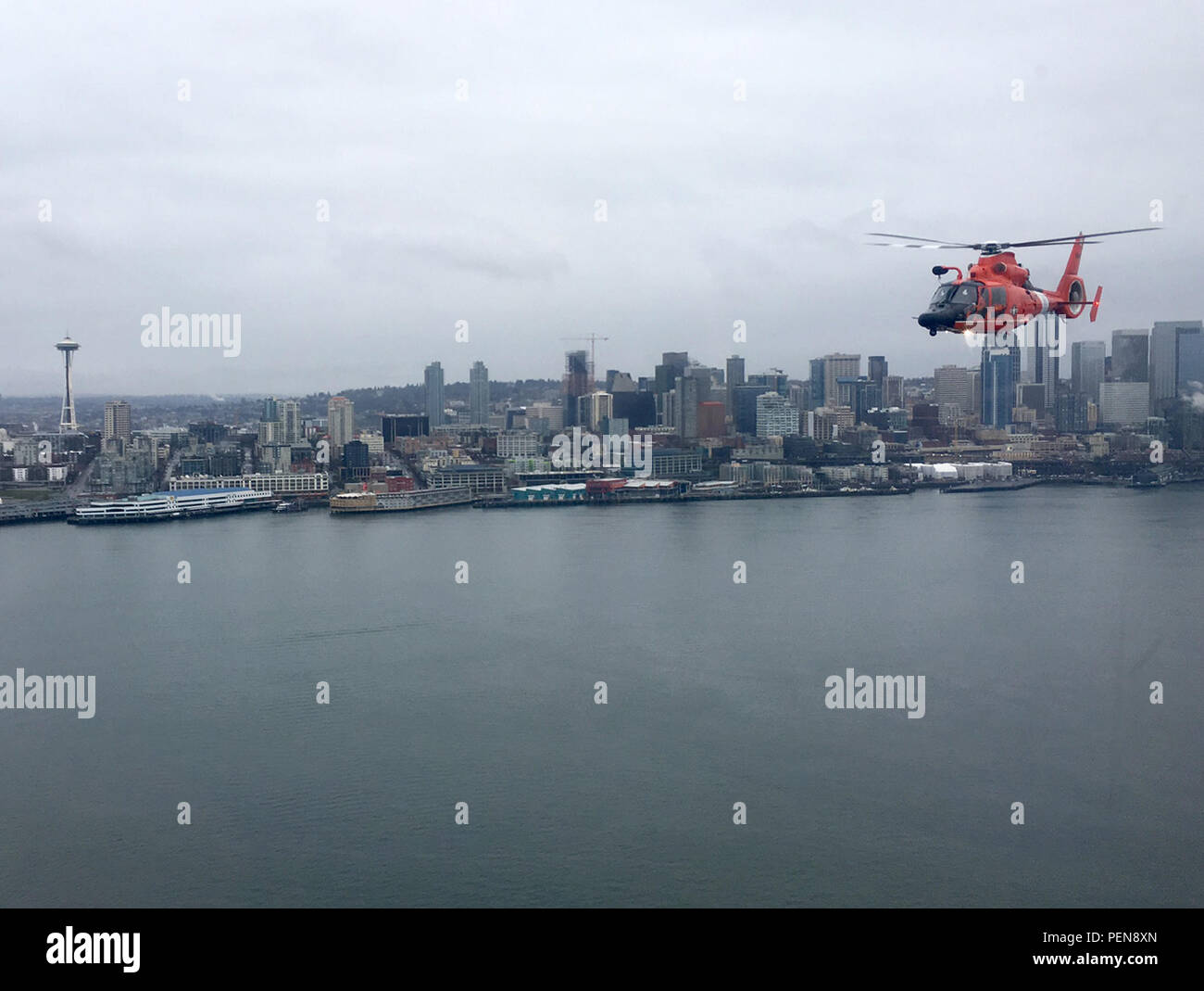 An MH-65 Dolphin helicopter from Coast Guard Air Station Port Angeles ...