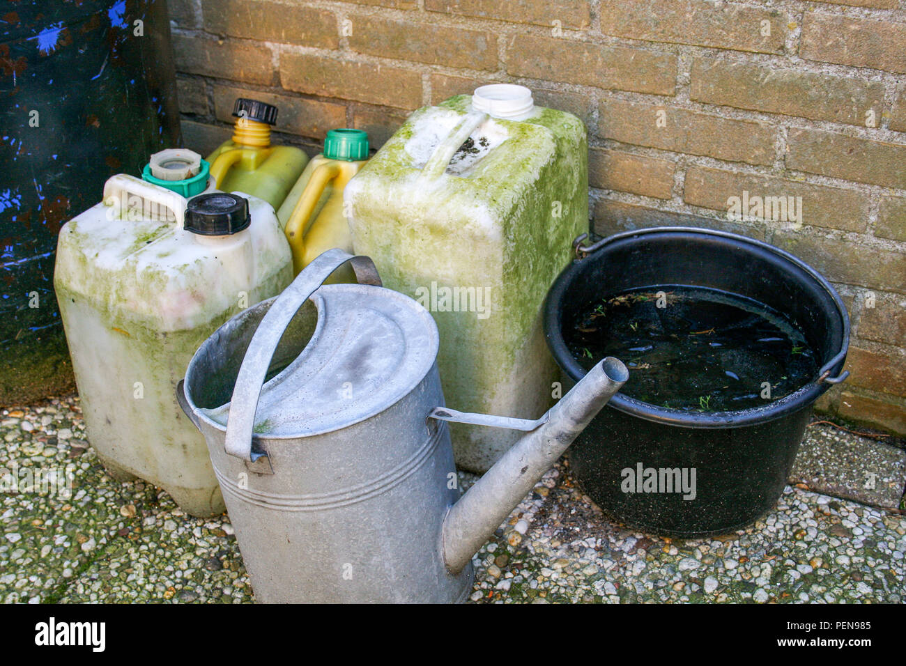 Water filled buckets hi-res stock photography and images - Alamy
