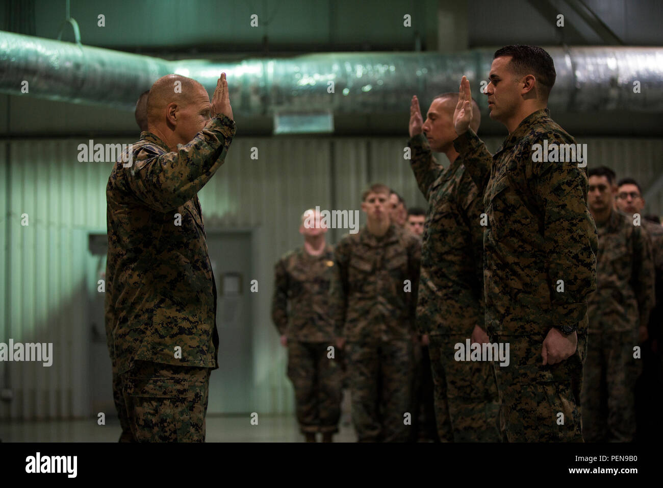 General Robert B. Neller, Commandant of the Marine Corps, reenlists two ...