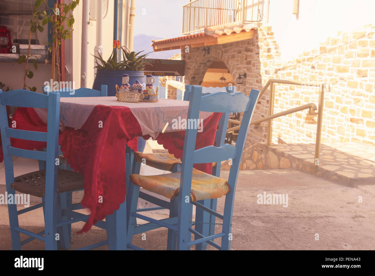 Outside greek restaurant table beach hi-res stock photography and ...