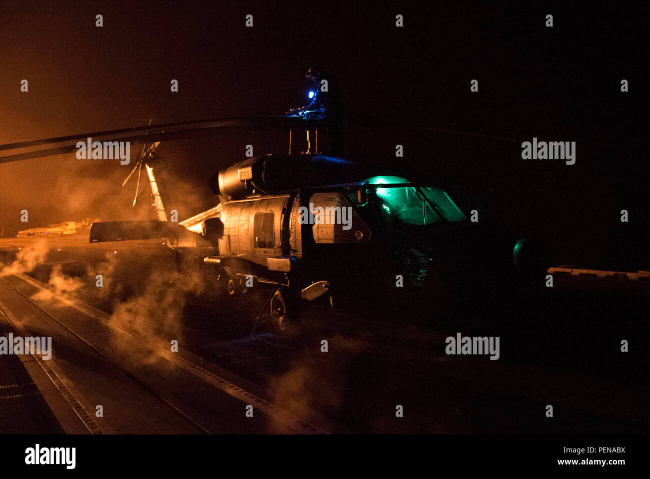 151231-N-DZ642-247 ARABIAN GULF (Dec. 31, 2015) Sailors prepare an MH ...
