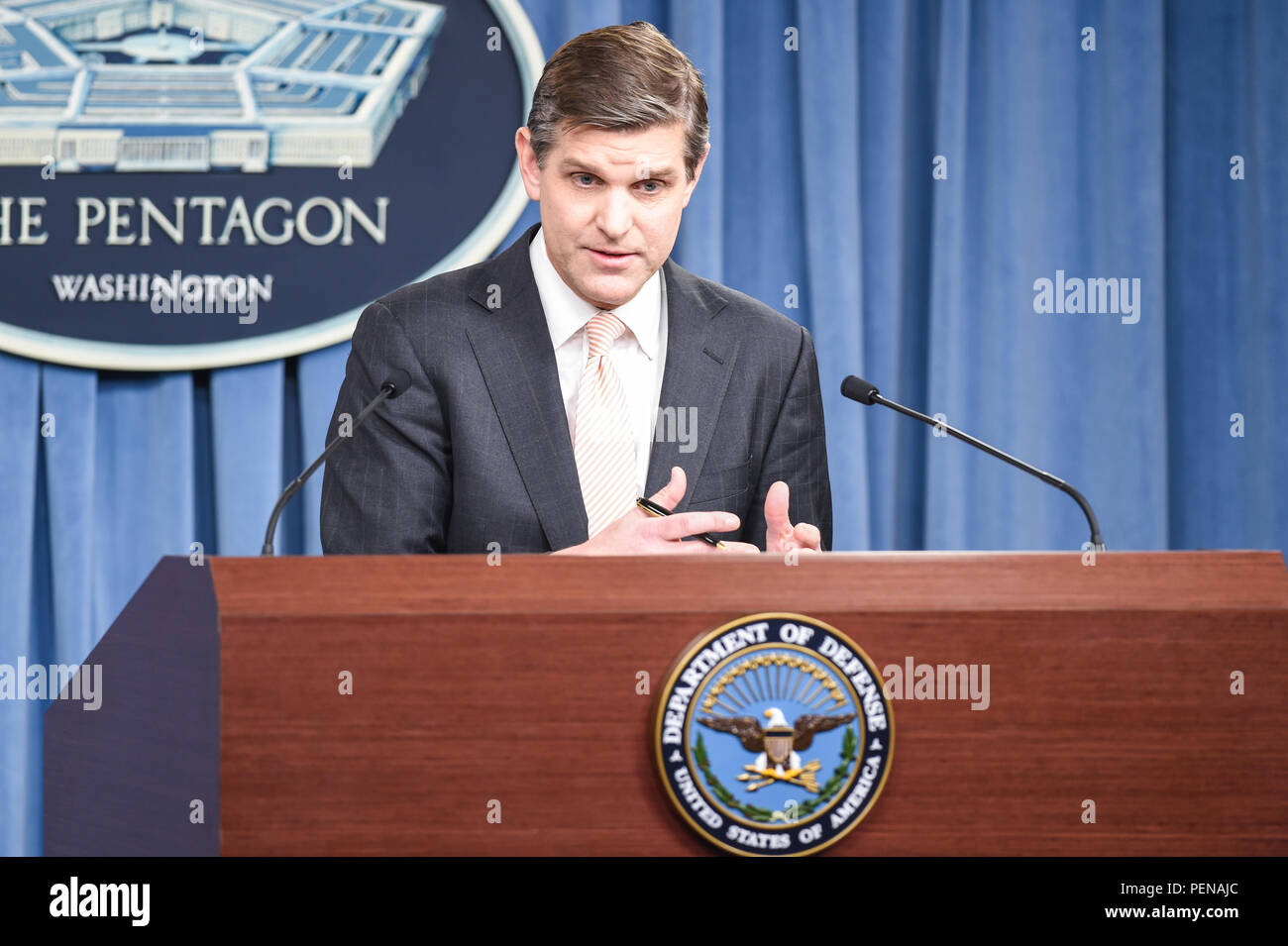 Pentagon Press Secretary Peter Cook conducts a press briefing with ...