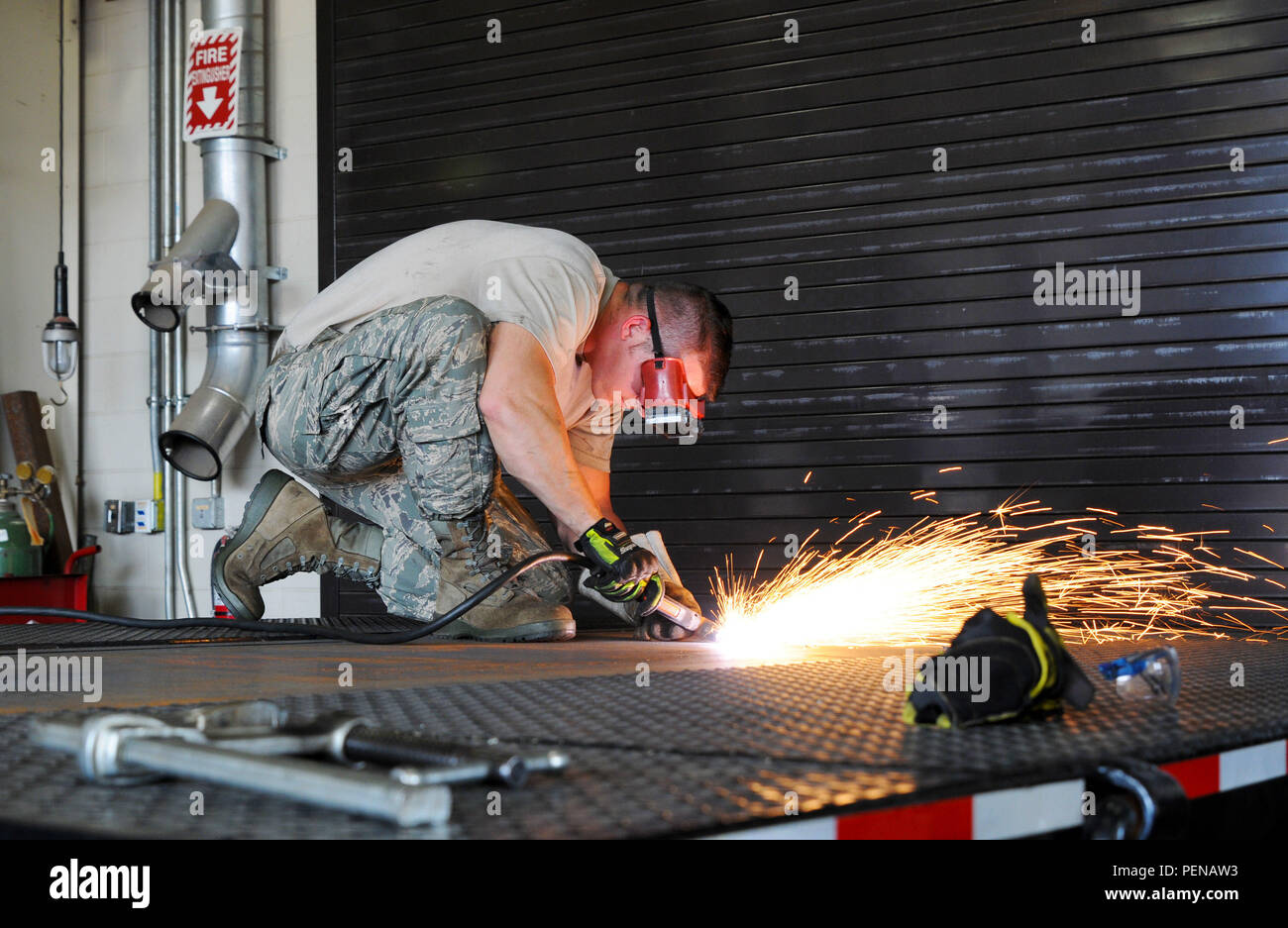 Tech. Sgt. Christopher Corbit, 188th Vehicle Maintenance, uses a plasma ...