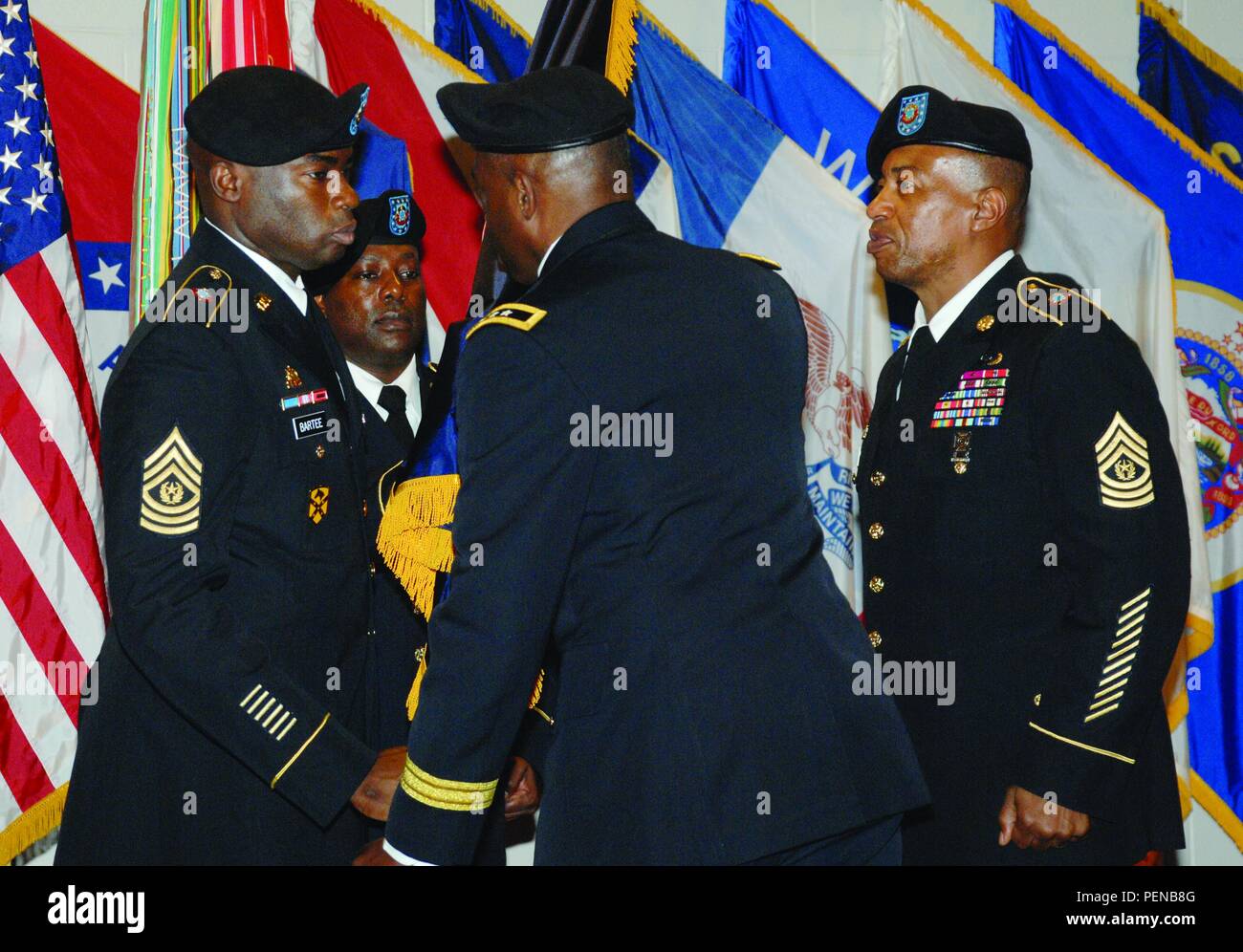 Command Sgt. Maj. Nathaniel J. Bartee Sr. takes the command flag from ...