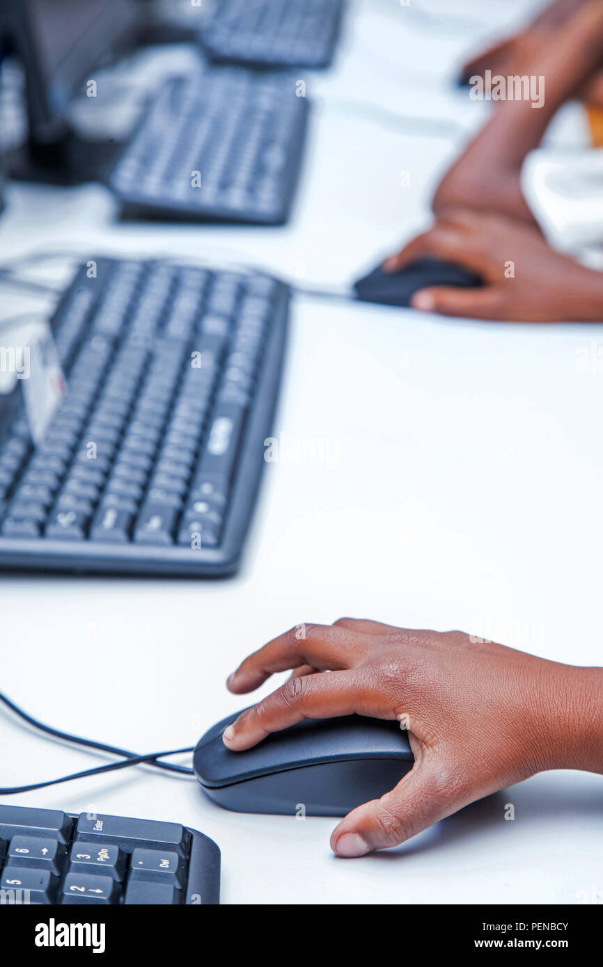 Child computer classroom hand mouse hi-res stock photography and images ...