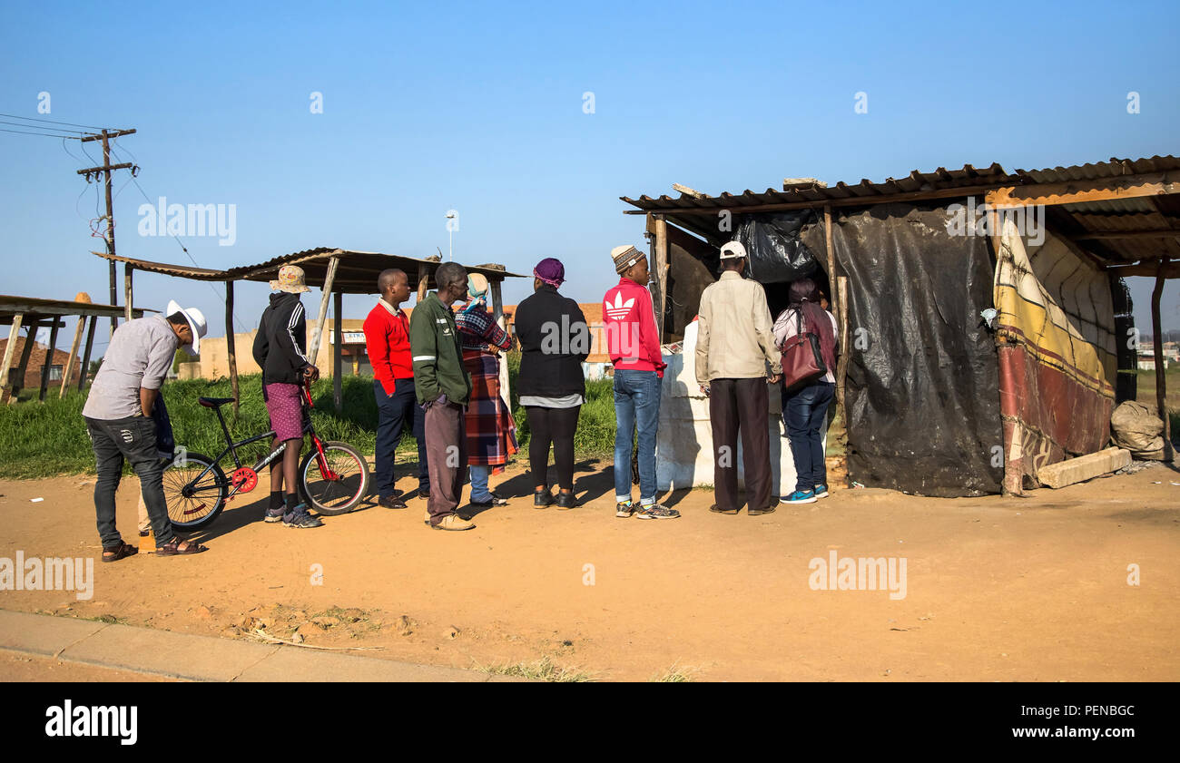 Johannesburg, South Africa - 3 May, 2018: People waiting in a line at ...