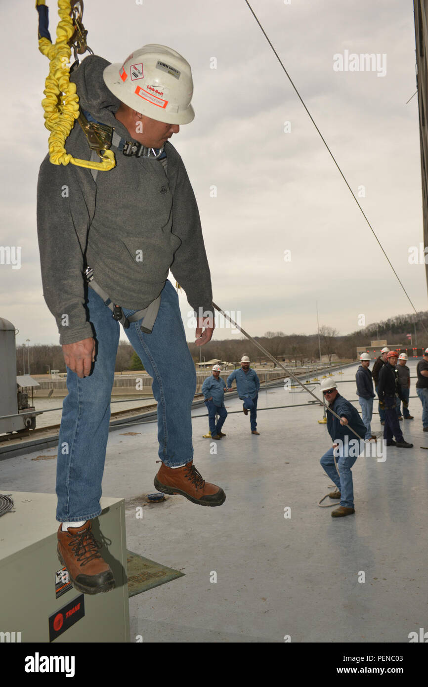 A group holds Anthony Certeza suspended in the air during fall ...
