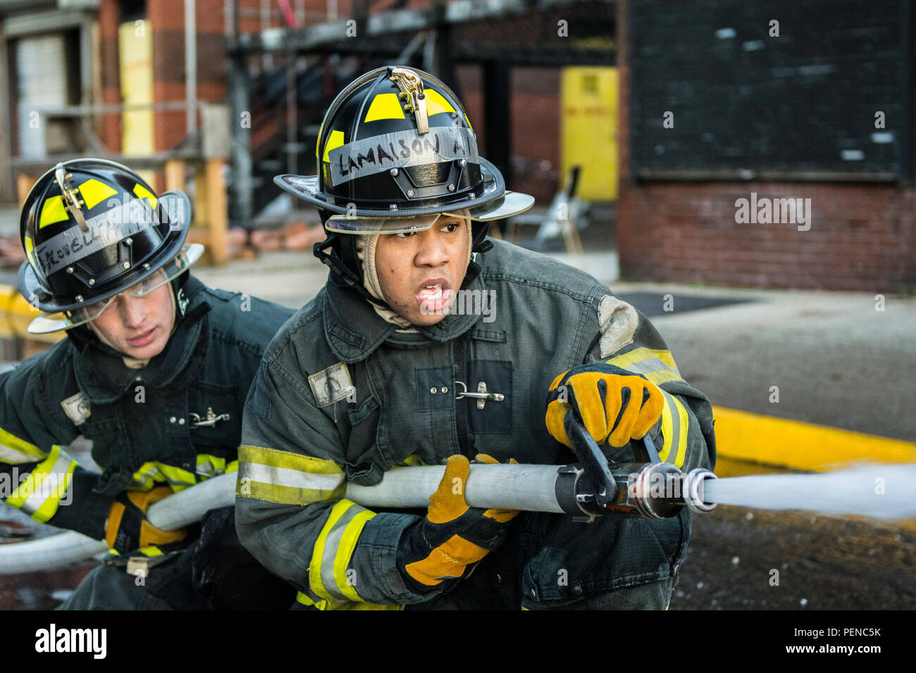 Probationary firefighters in their second week of training at the New ...