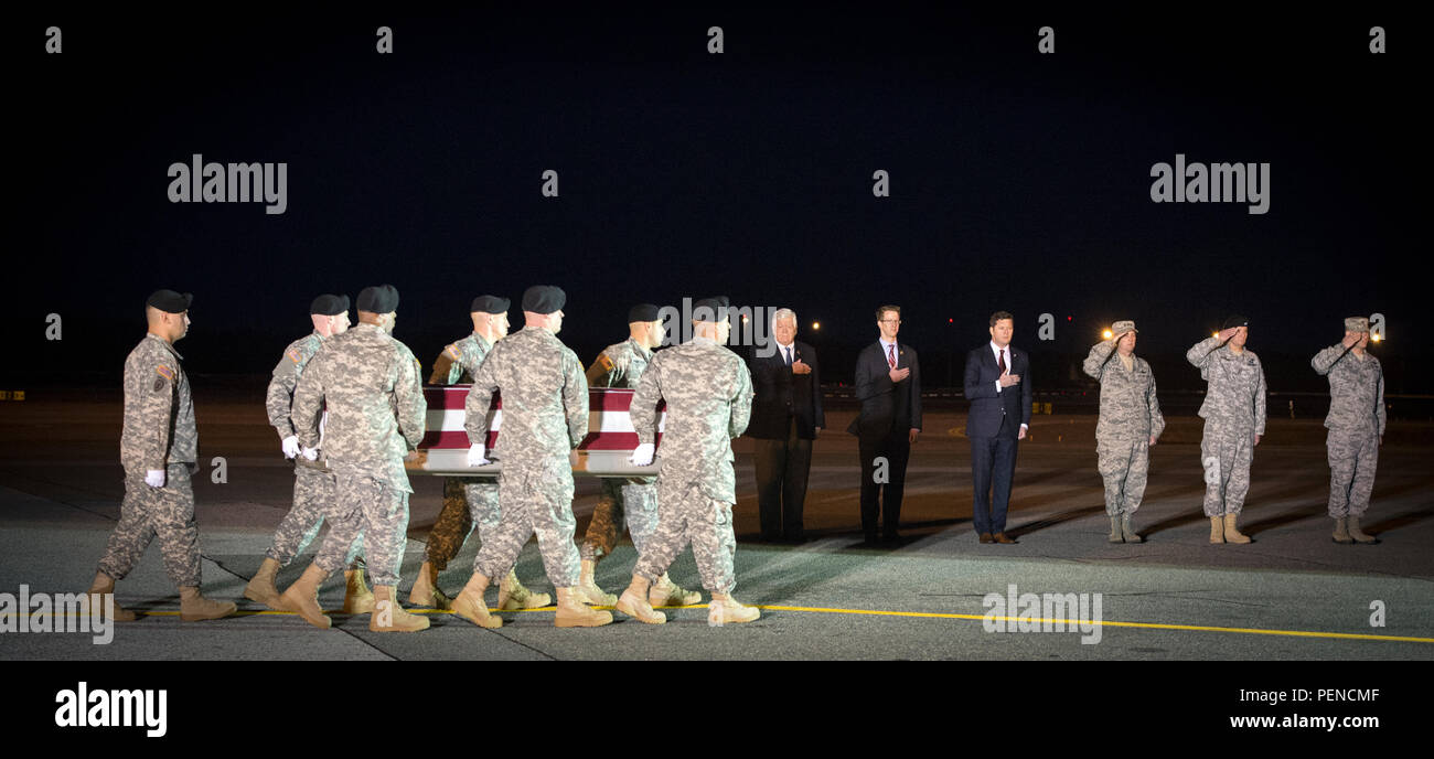 Under Secretary of the Army Patrick J. Murphy renders honors as a U.S ...
