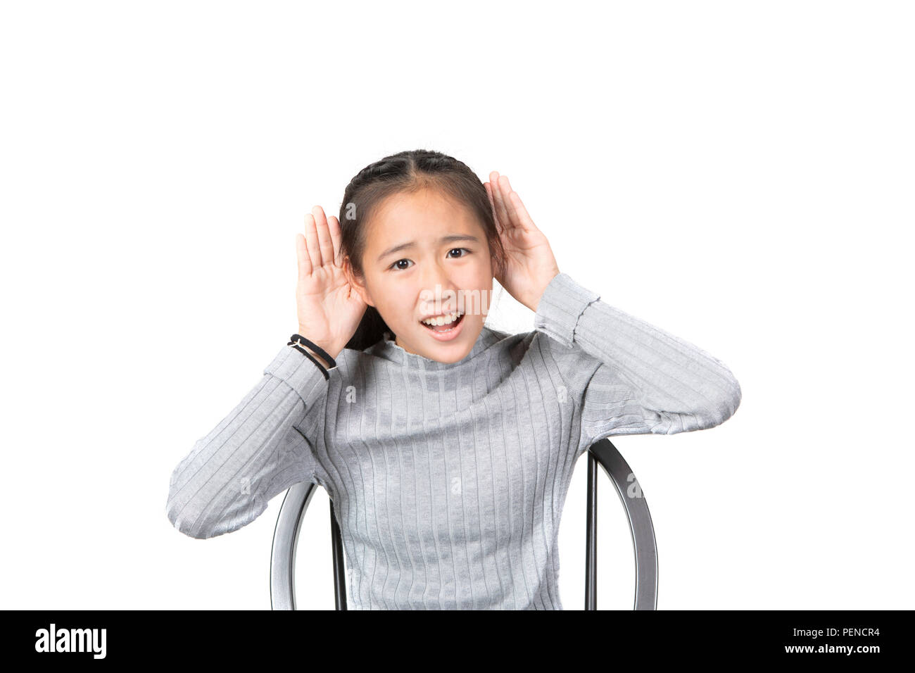 asian teenager raise hand up to hearing isolated white background Stock ...