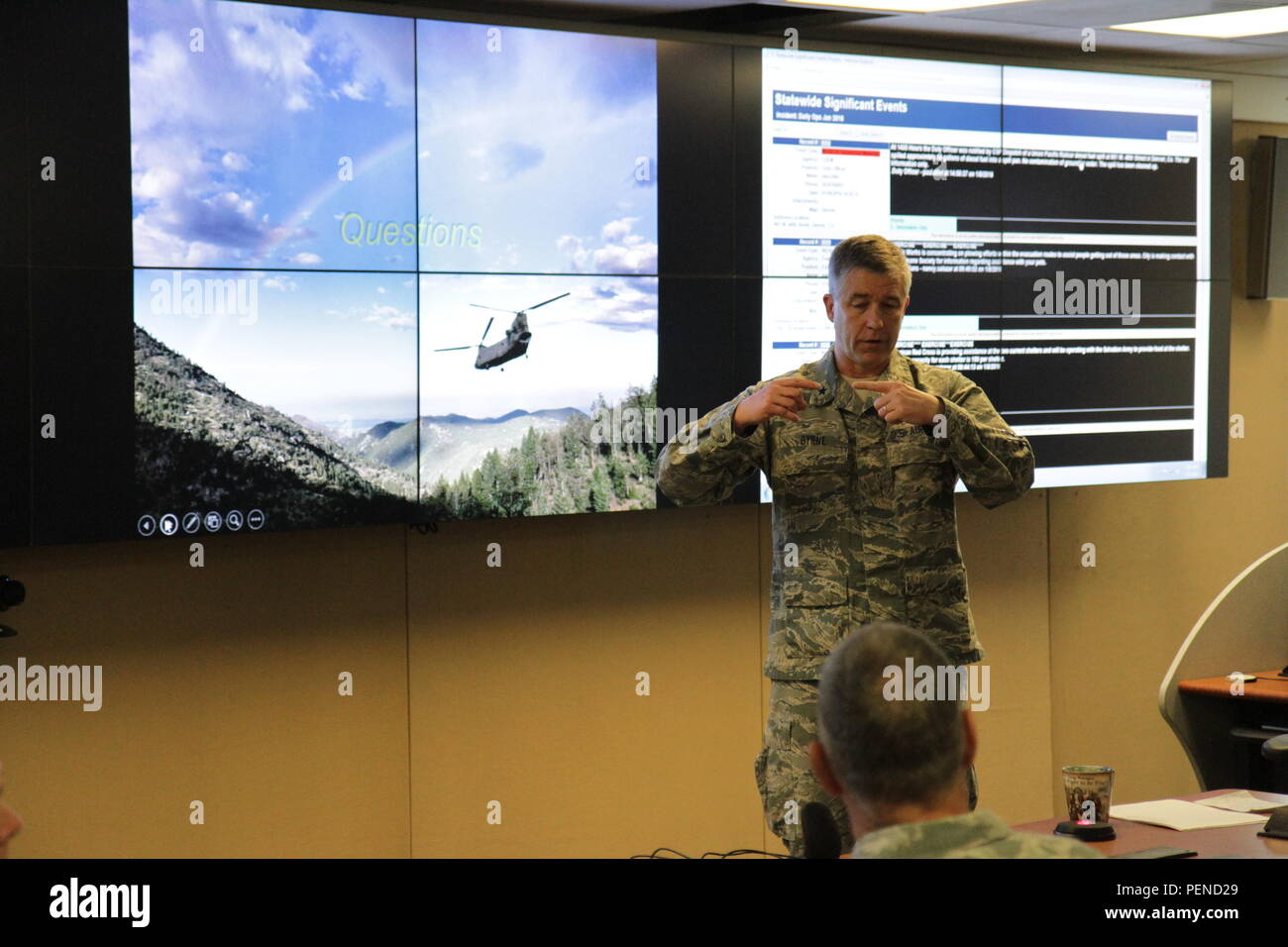 Brig. Gen. Peter Byrne conducts a briefing with Colorado leaders at ...