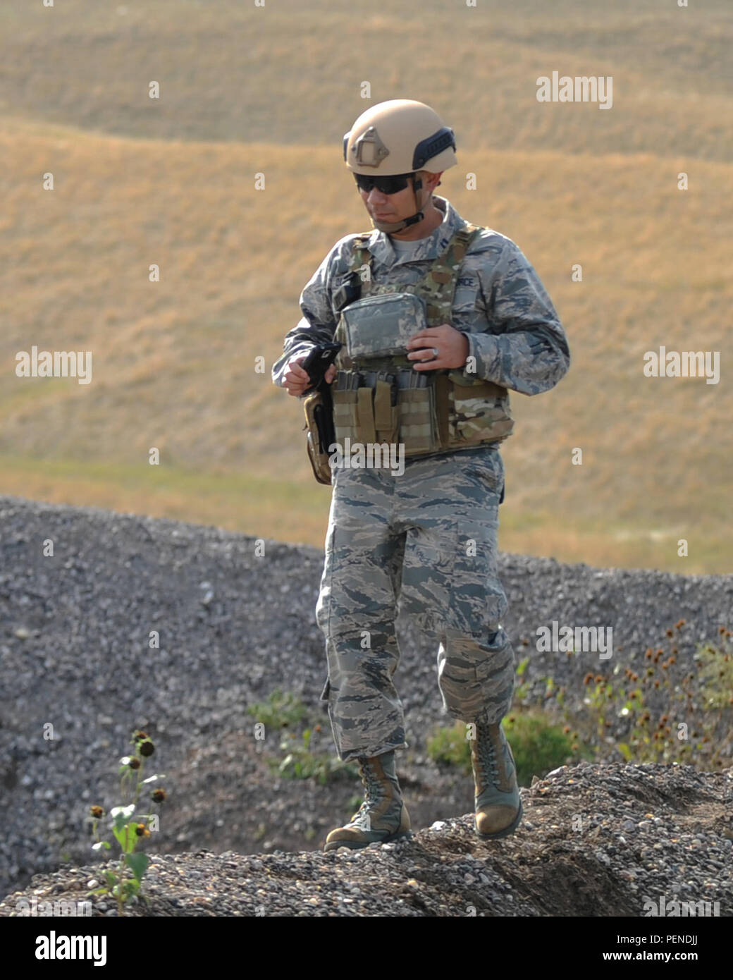 Capt. Benjamin Quintanilla, 28th Bomb Wing chaplain, looks around the ...