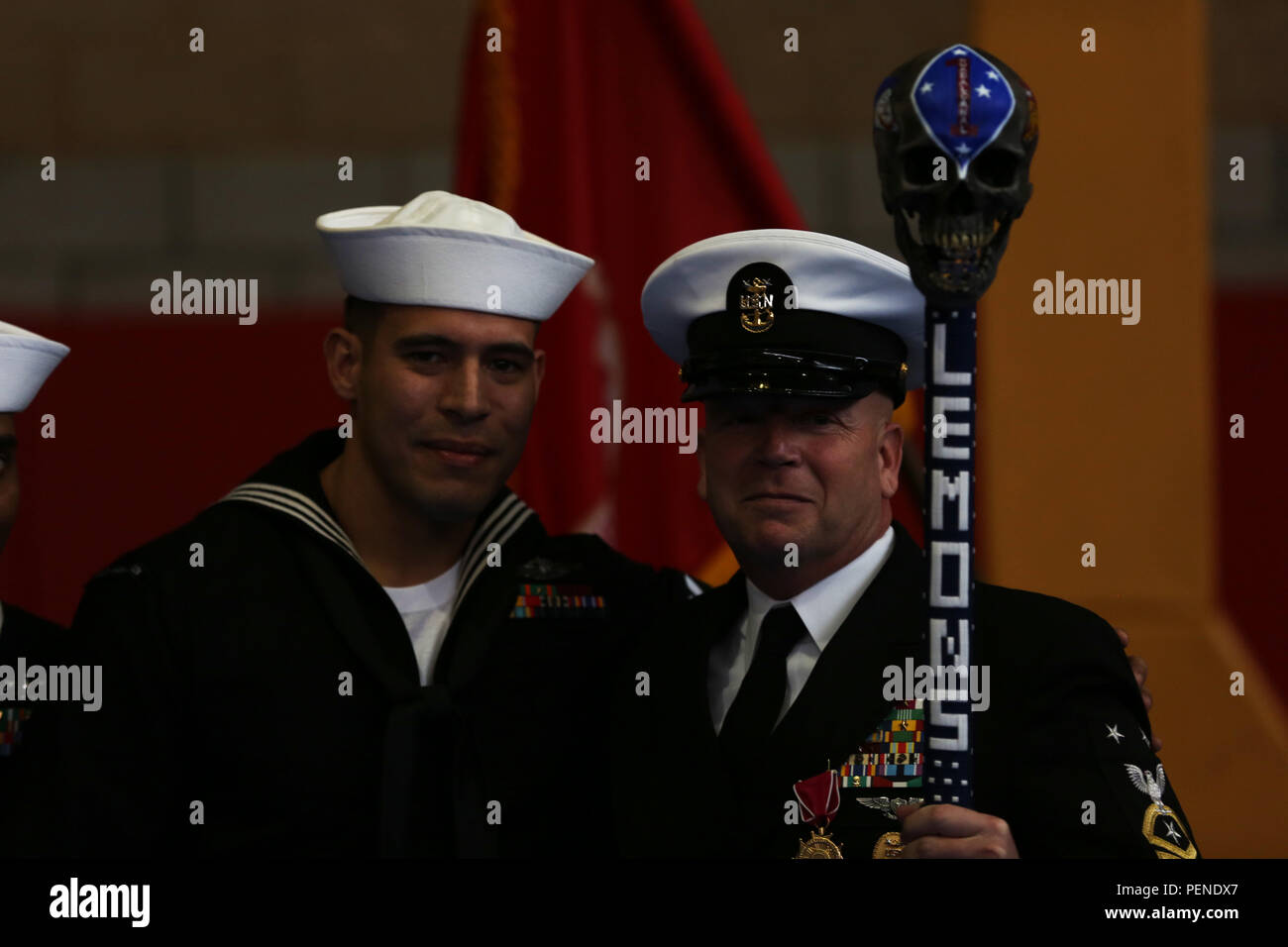 Master Chief Petty Officer Robert Lemons (right), the command master ...