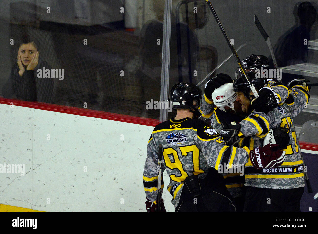 Army players celebrate Staff Sgt. Cameron Penney's third-period goal ...