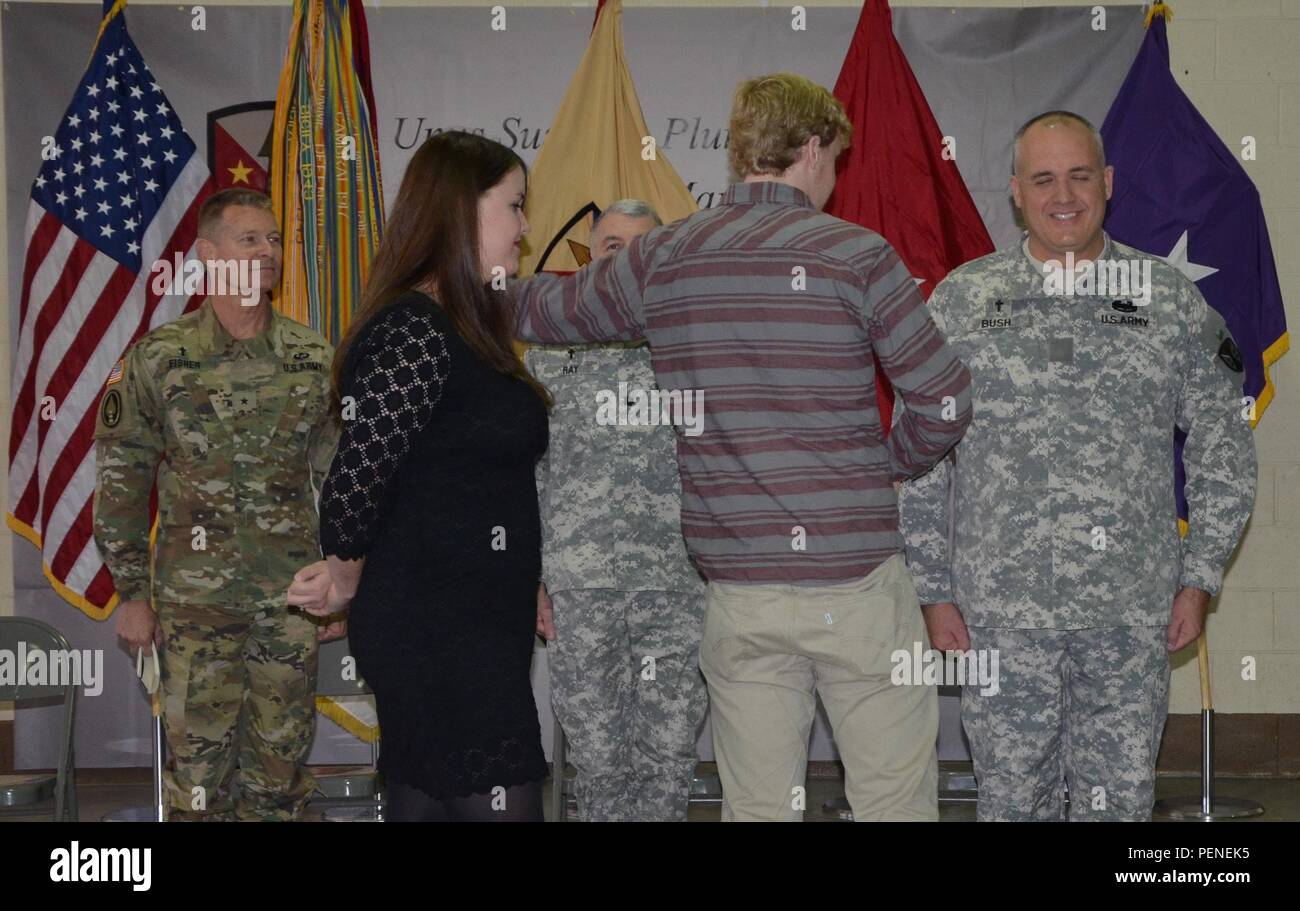 Chaplain (Maj.) Jeffery Bush’s son, Andrew, removes the rank of major ...