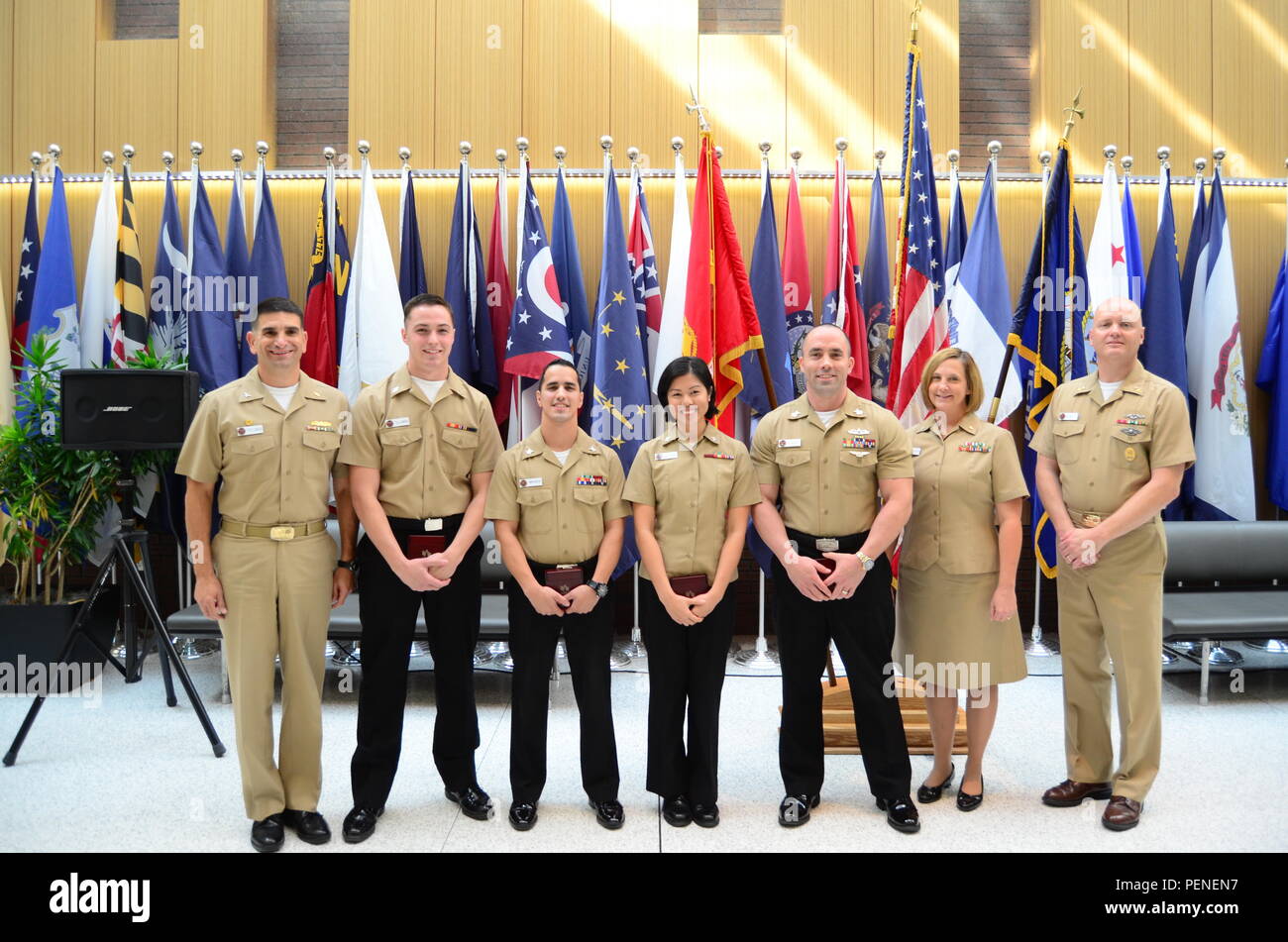 Naval Hospital Camp Lejeune Sailors pose with the NHCL command triad during the ceremony ...