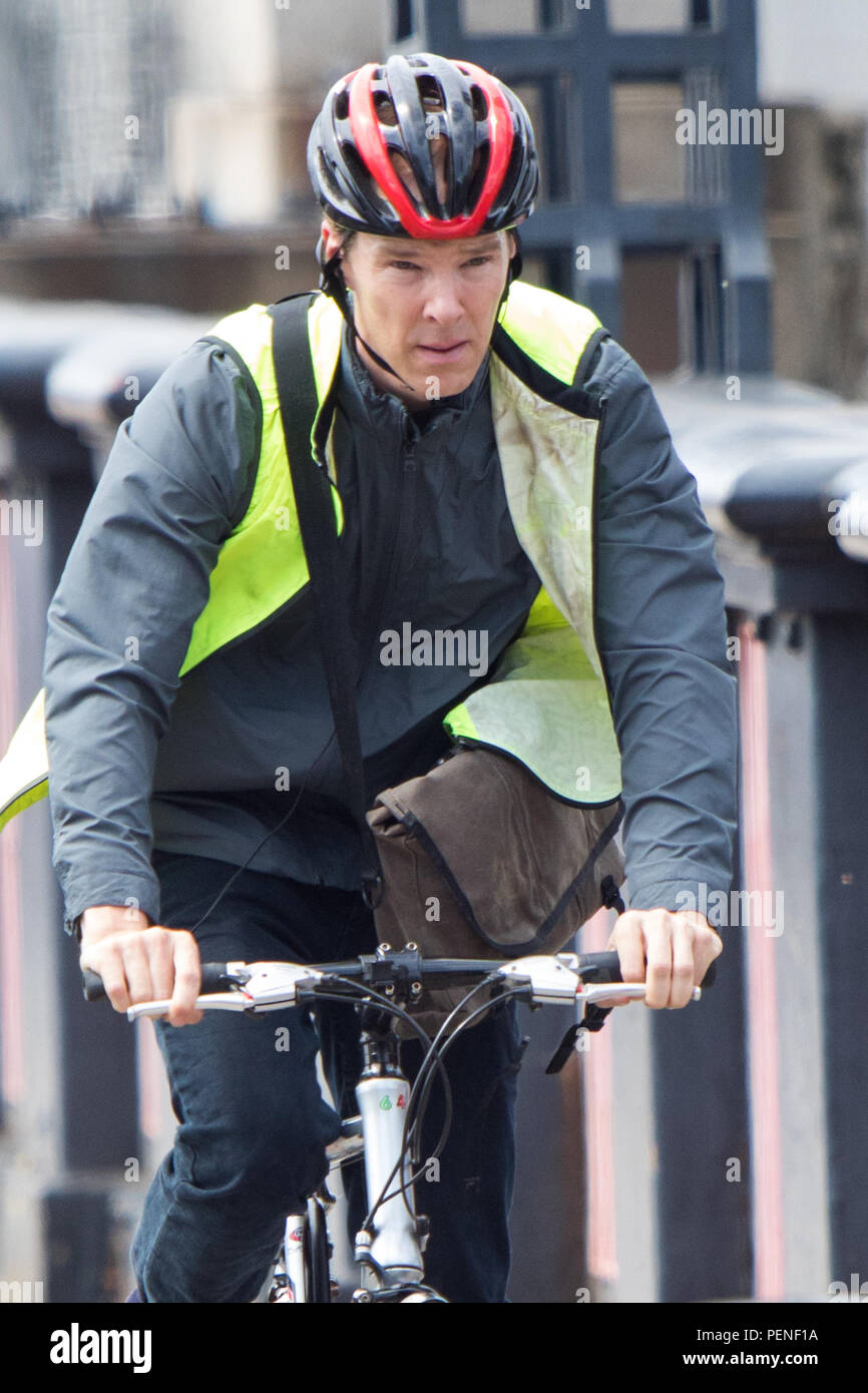 Benedict Cumberbatch riding a bike across Lambeth Bridge, London ...
