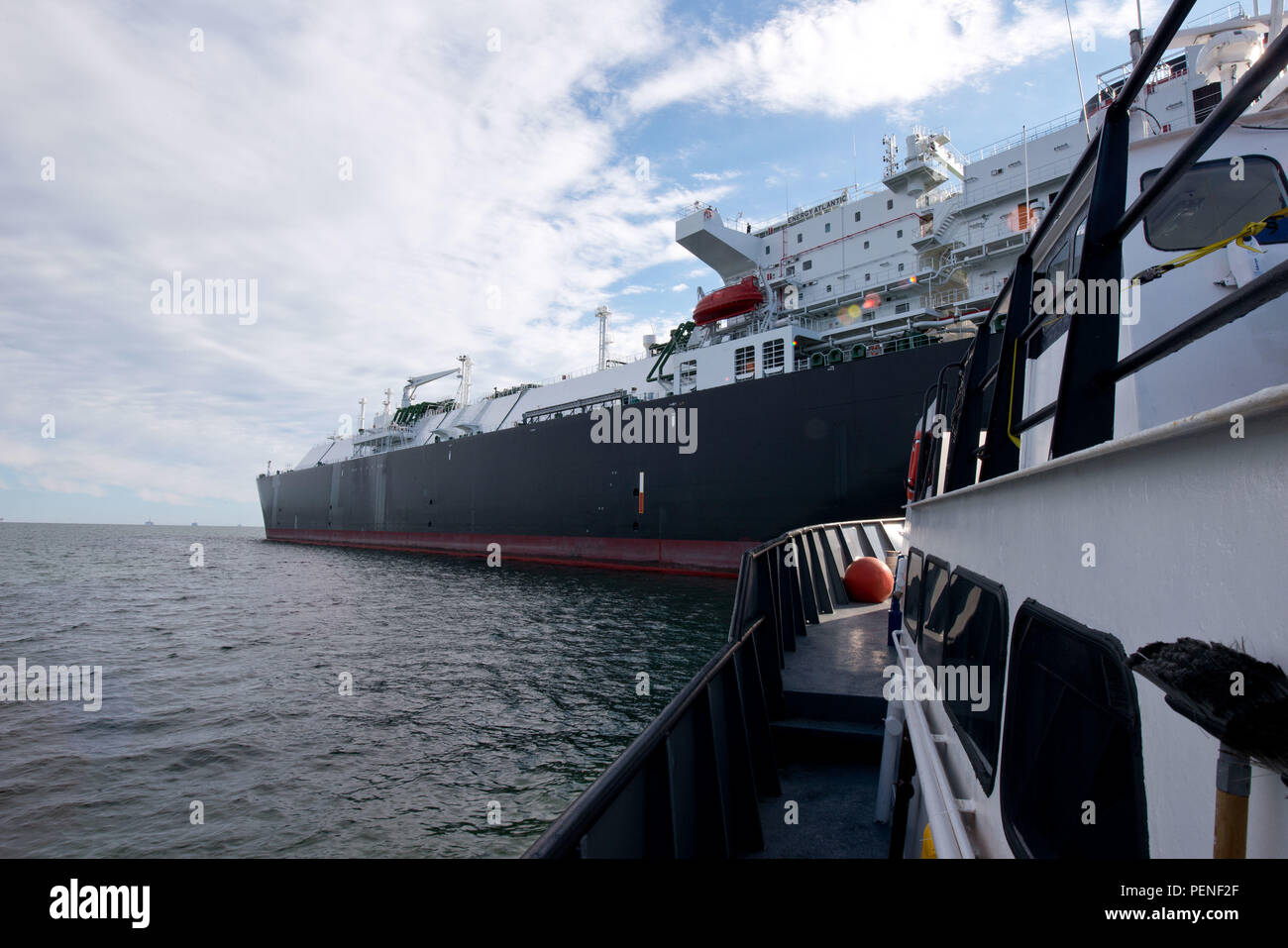 The port side of the Energy Atlantic comes into view before an ...