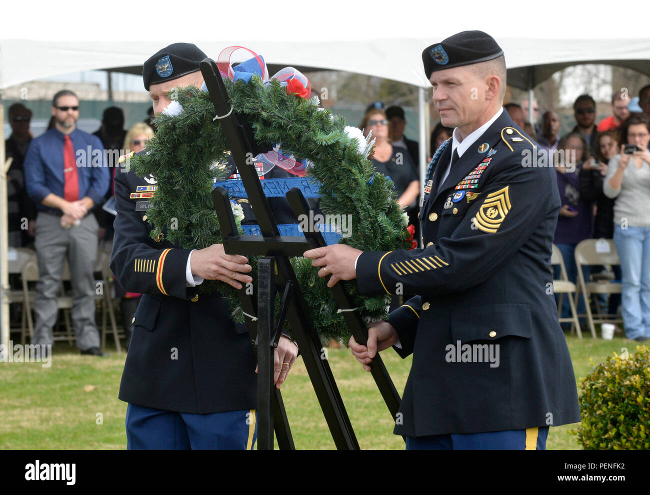 U.S. Army Col. Brett Sylvia, left, the commander of the 2nd Brigade ...