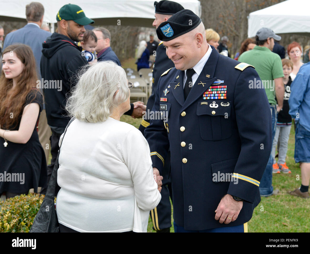 U.S. Army Col. James Salome, right, the garrison commander speaks to ...
