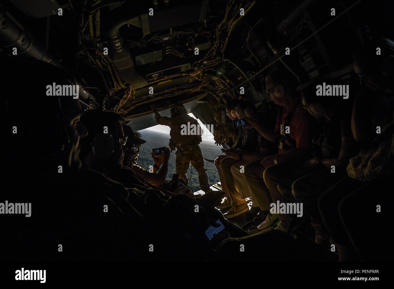 Senior Leader Engagement Program members take video of an aerial gunner ...