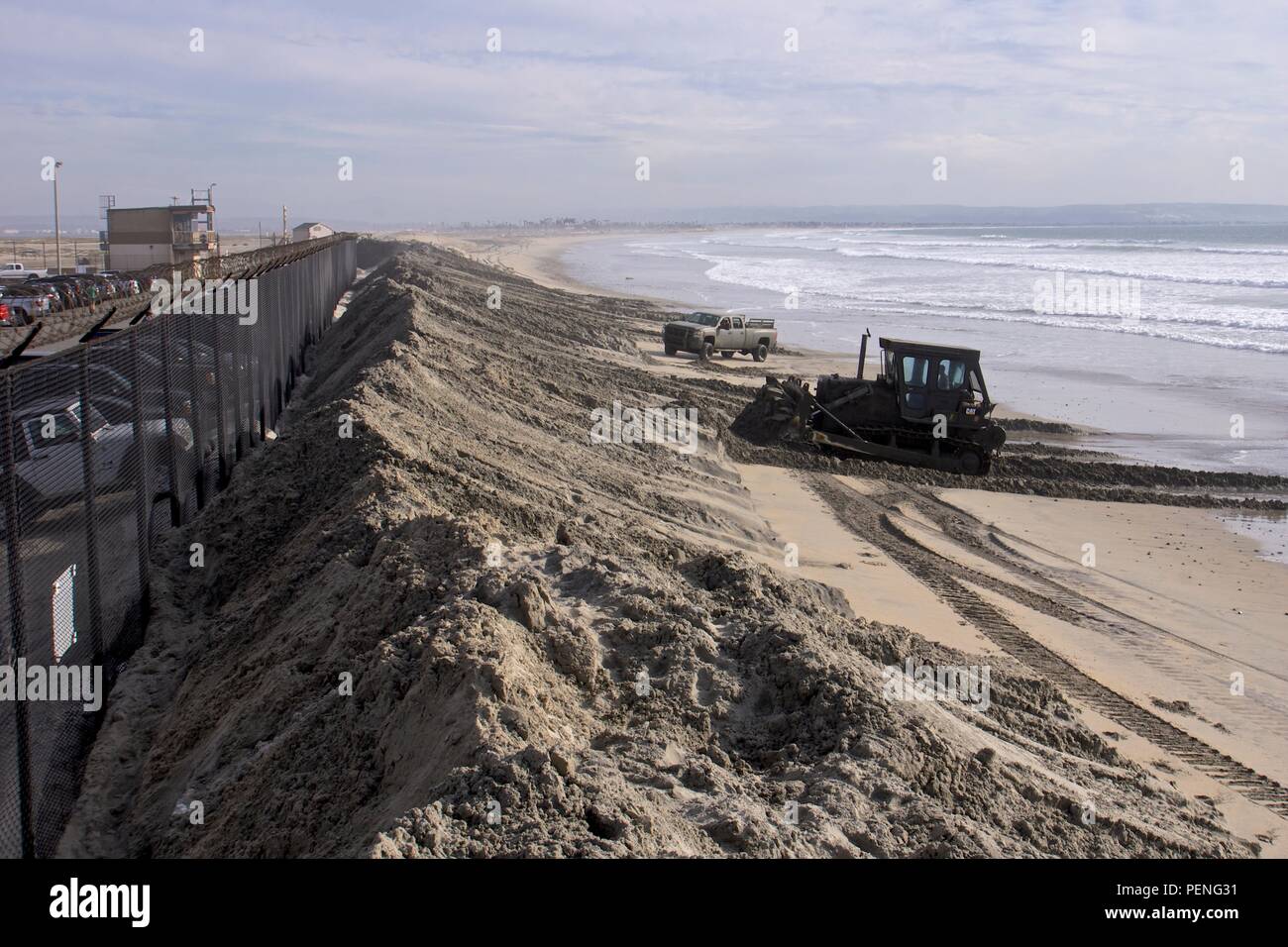 CORONADO, Calif. (Jan. 13, 2016) Seabees use a bulldozer to reinforce a ...