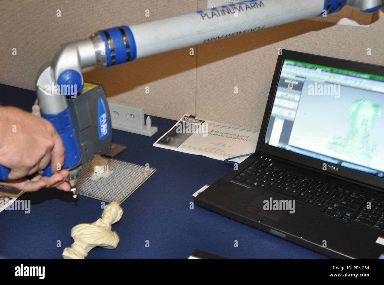 DAHLGREN, Va. - A Navy instrumentation engineer demonstrates how the 3 ...