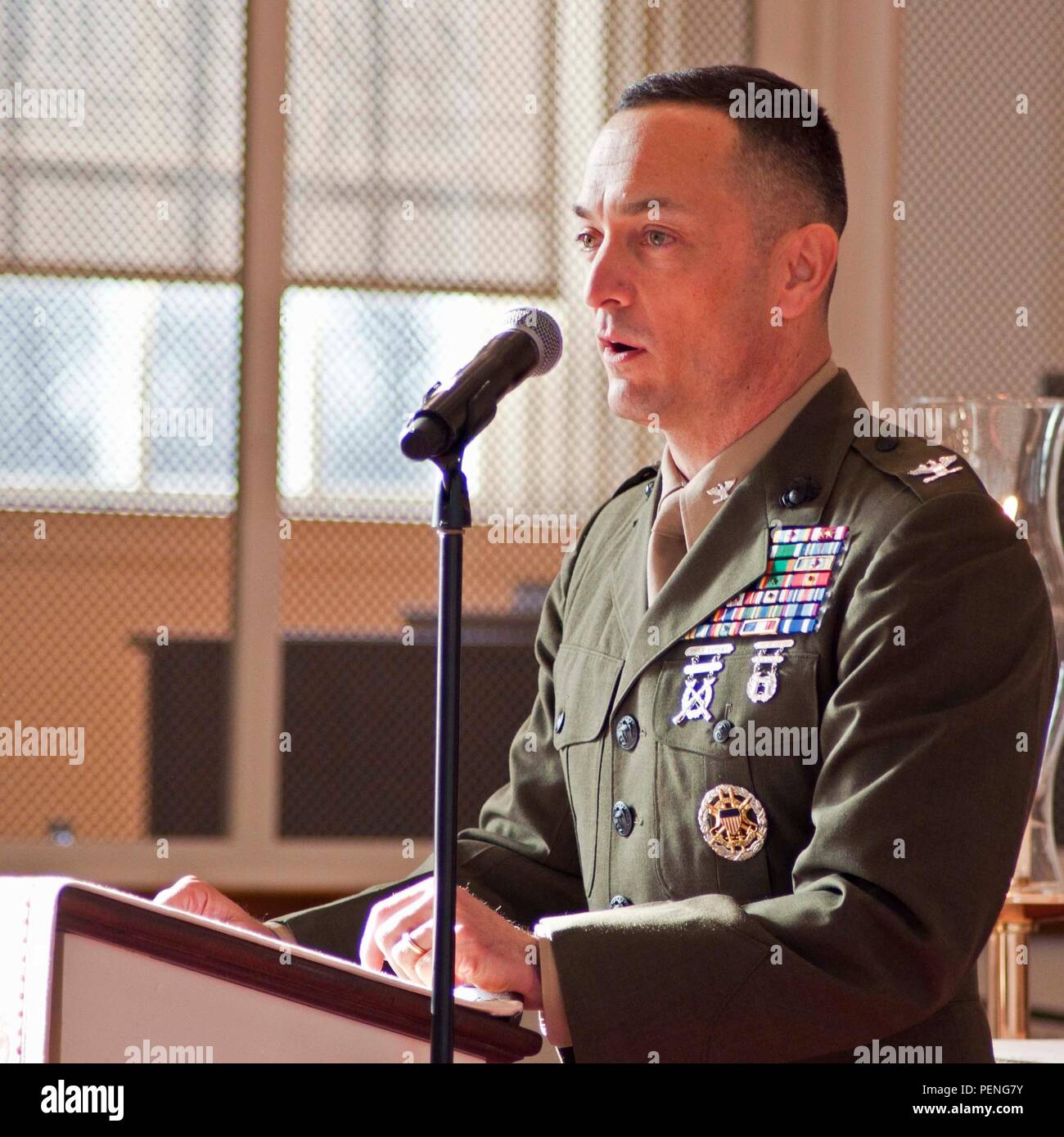 Col. Joseph Murray, base commander, speaks at the birthday observance ...