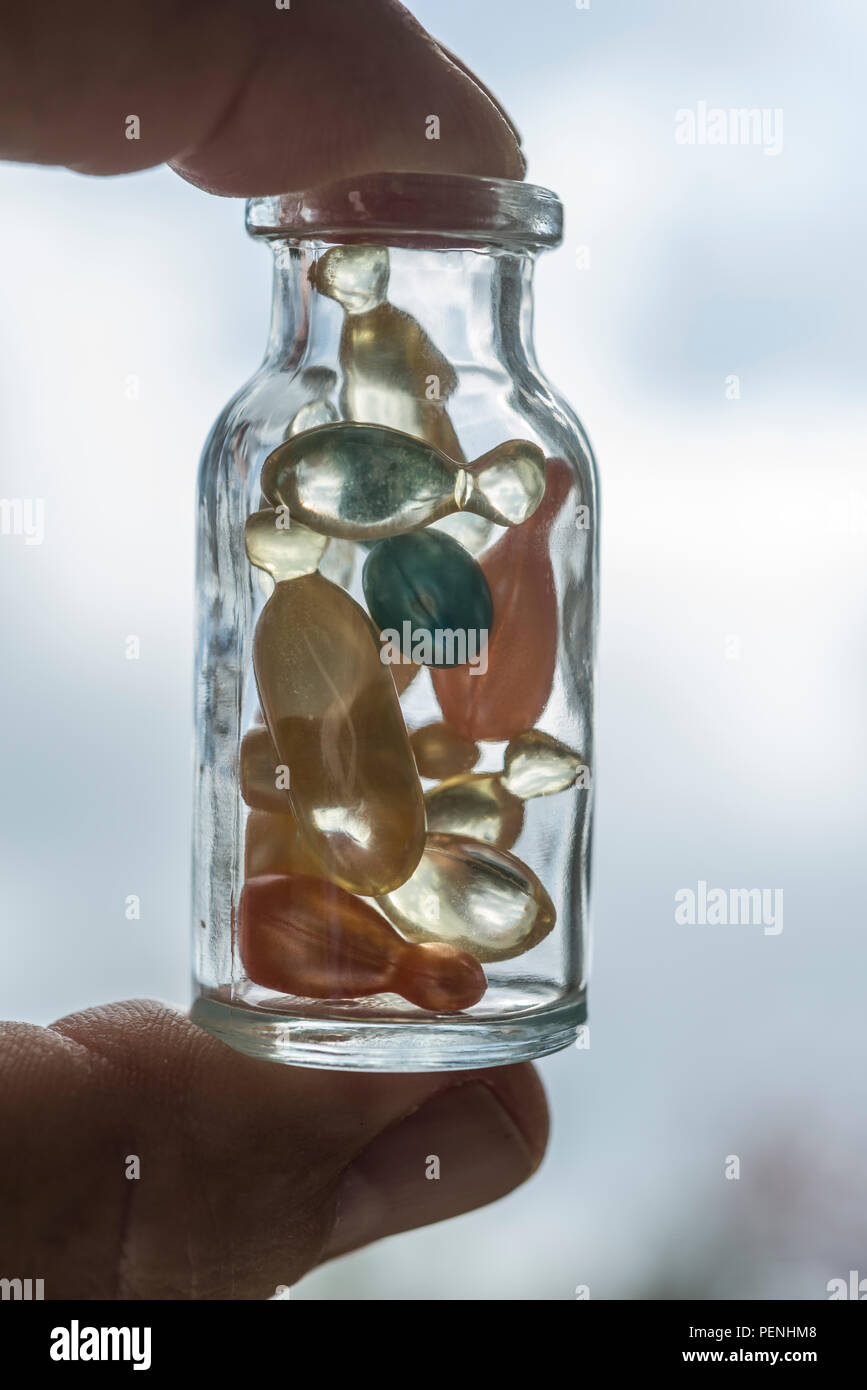 Vitamine gel capsules glass hi-res stock photography and images - Alamy