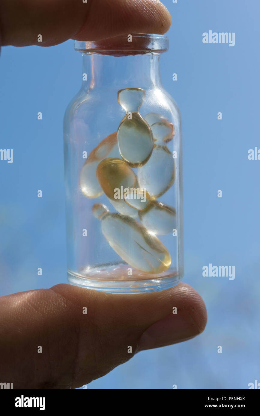 Vitamine gel capsules glass hi-res stock photography and images - Alamy