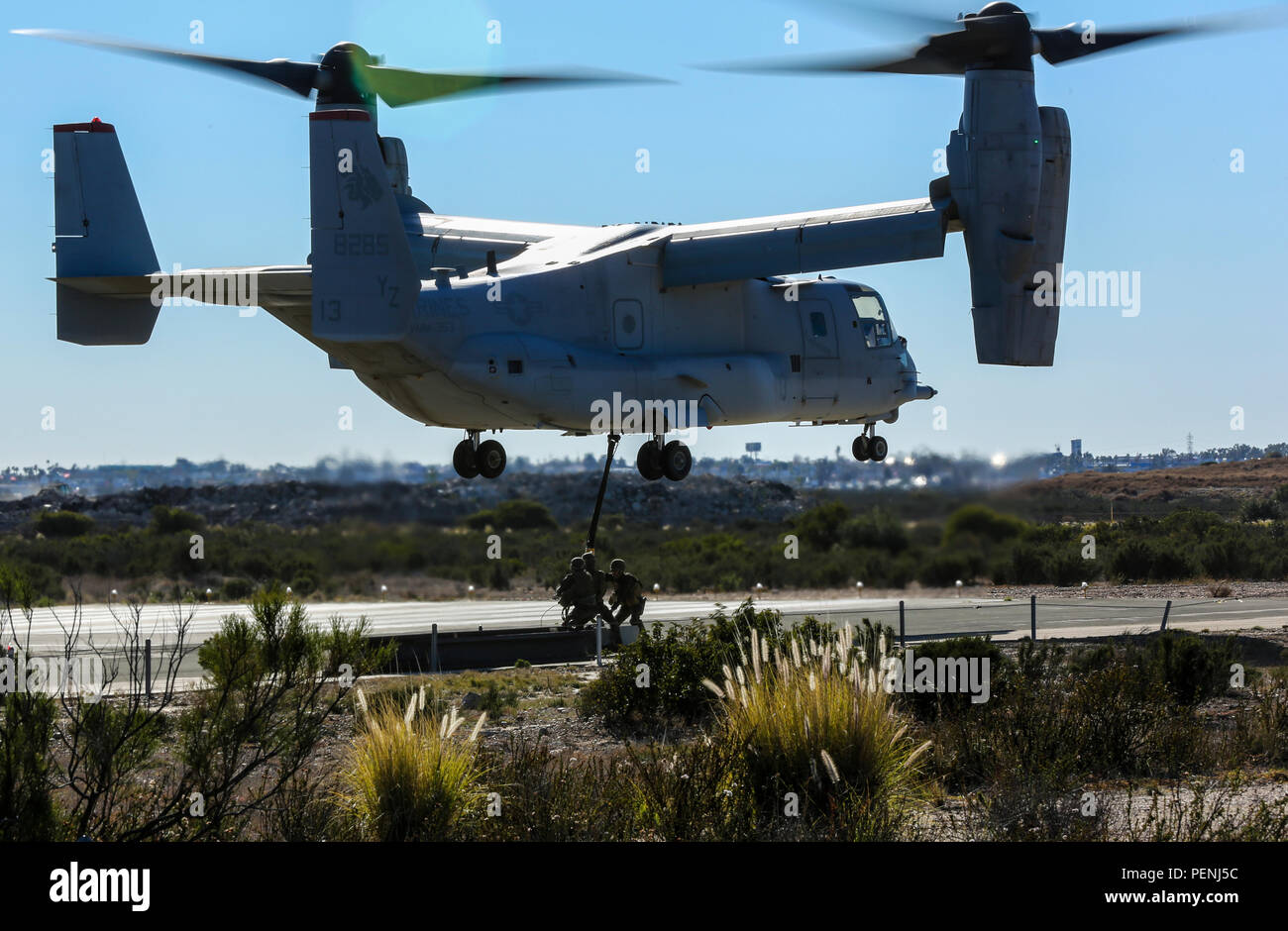 Marines from Combat Logistics Battalion 5 attached a 1,400-pound ...