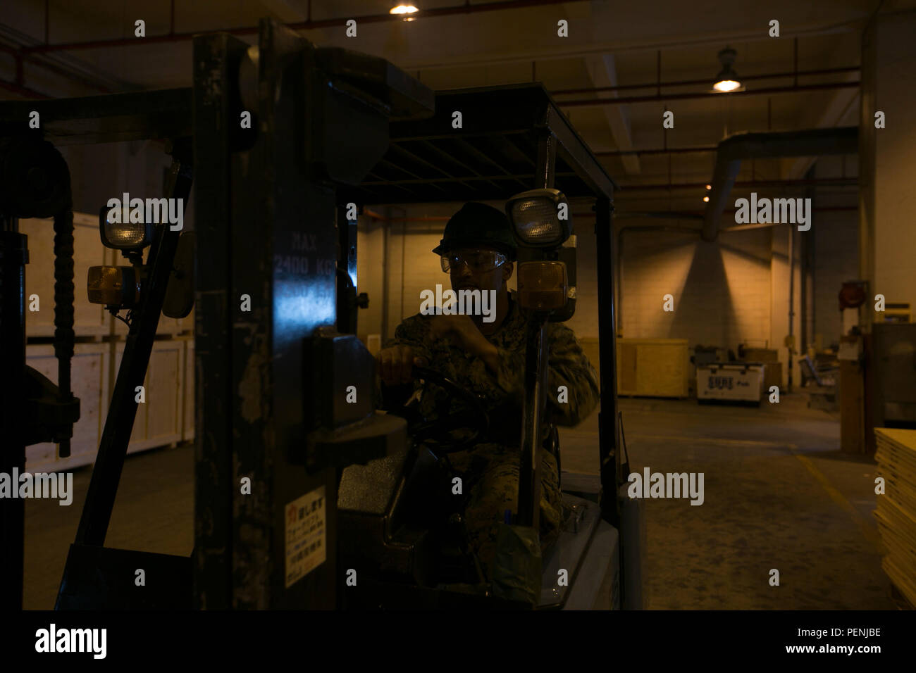 A freight specialist operates a fork lift Dec 18. in the distribution ...