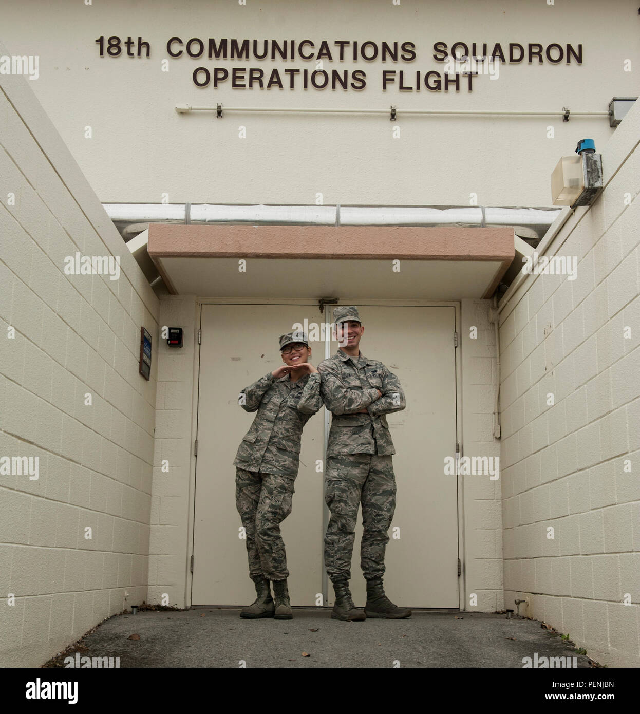 U.S. Air Force Airman 1st Class Katheryn Pae and Airman James Tufarelli ...