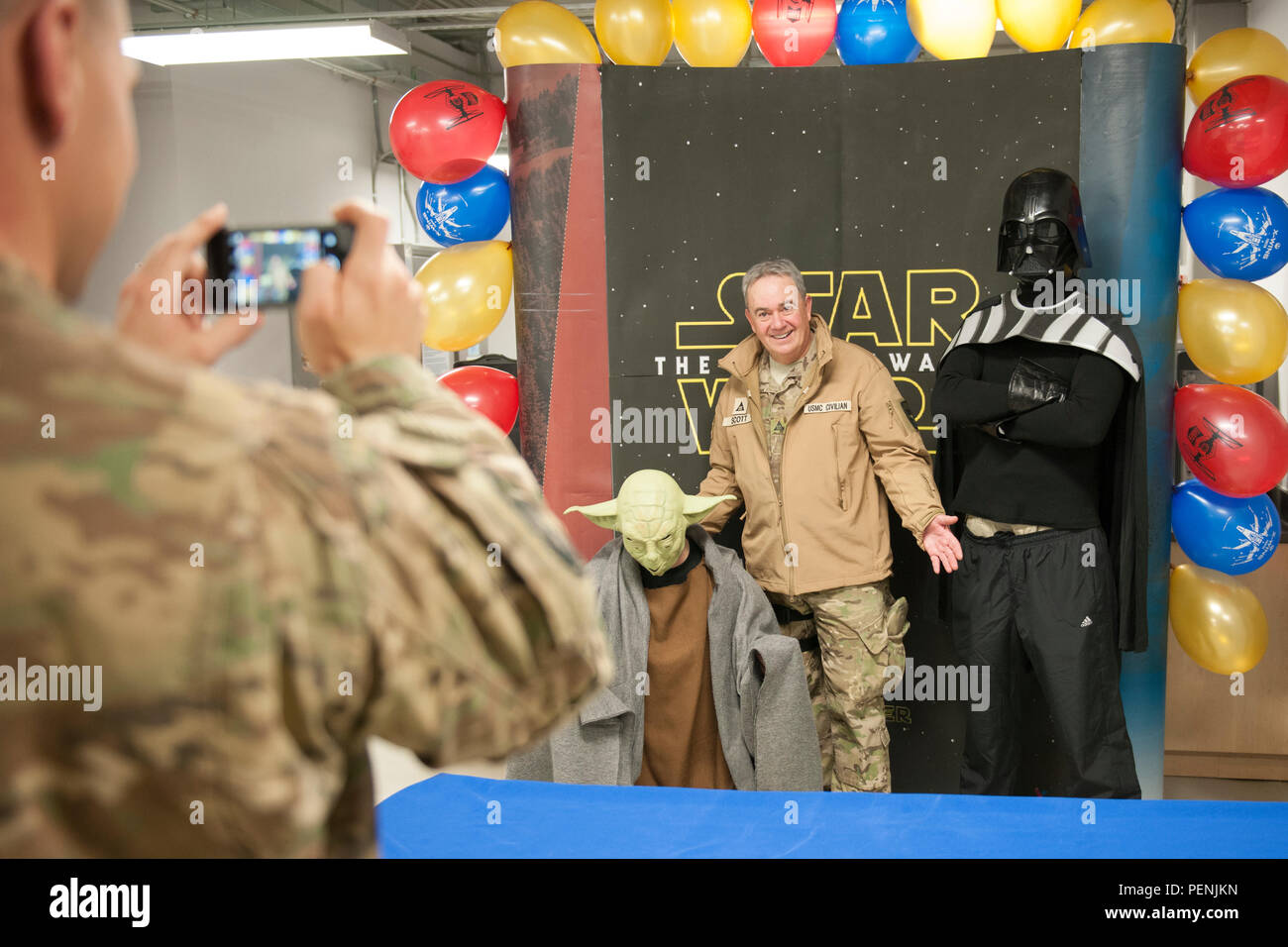 A DoD civilian poses with Steve Dalrymple, a salesman at the Military ...
