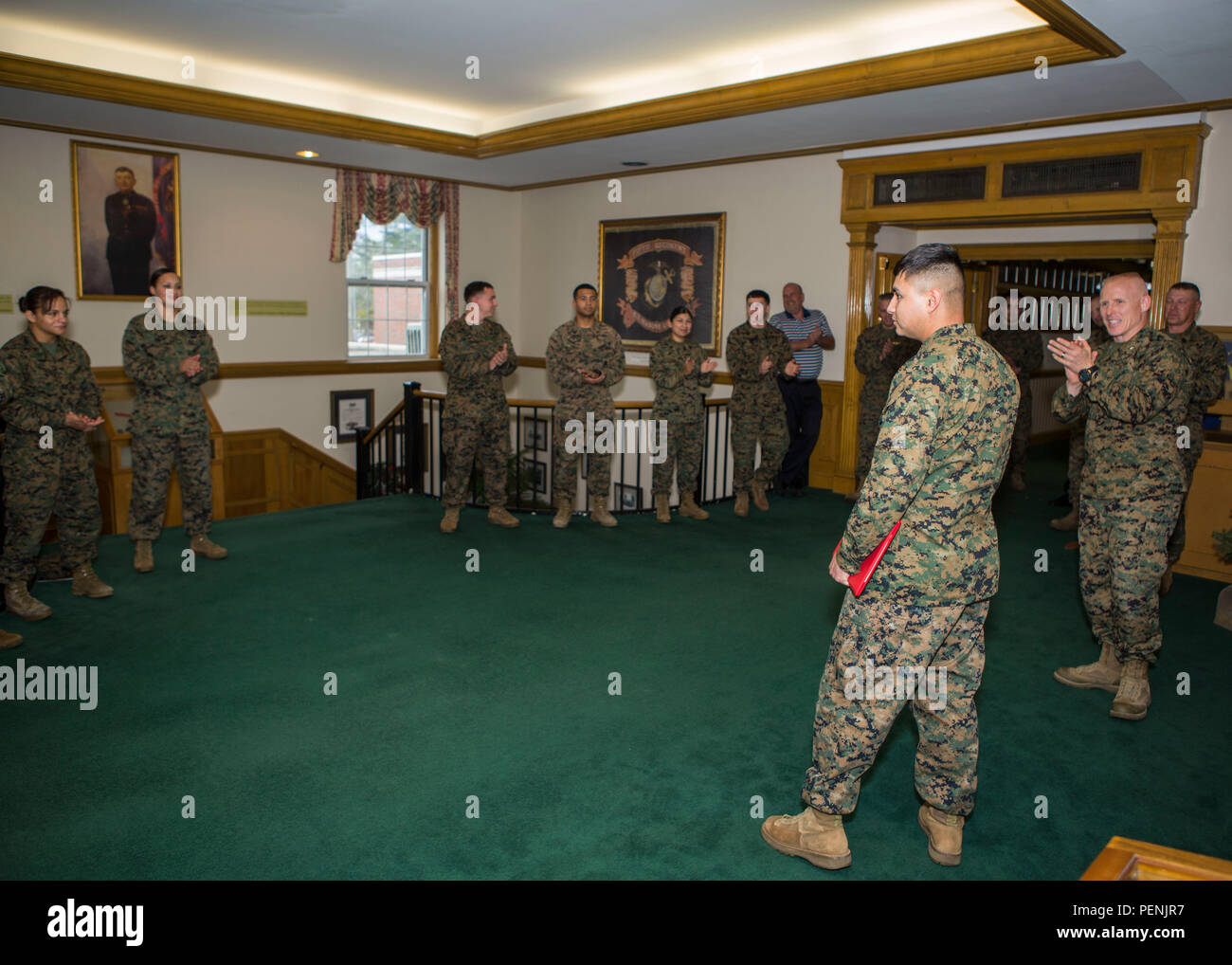 U.S. Marines congratulate Sgt. Diego Zarate, protocol chief, all with ...