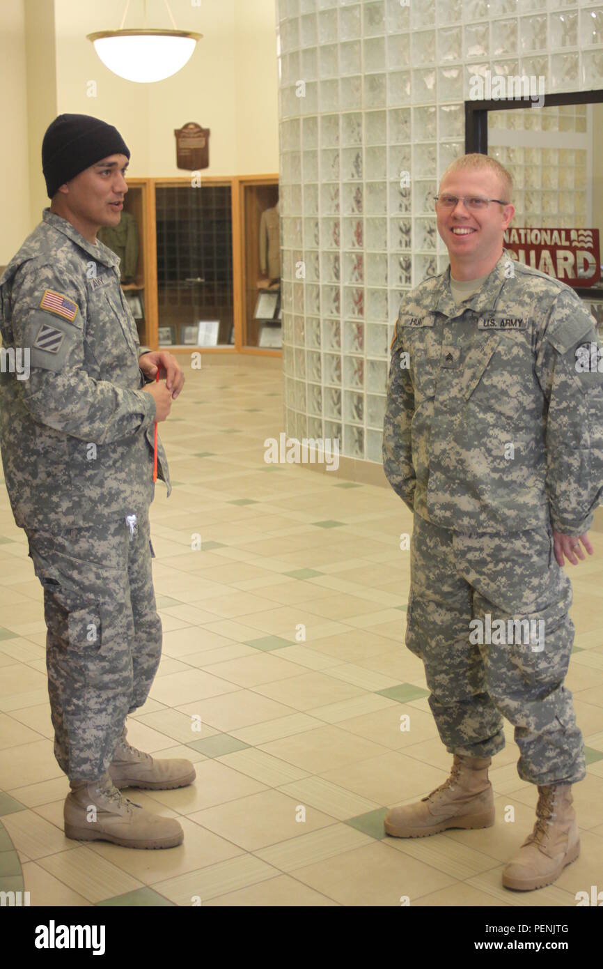 Sgt. Robert Hunt, a resident of John Day, Ore., (right) laughs with Sgt ...
