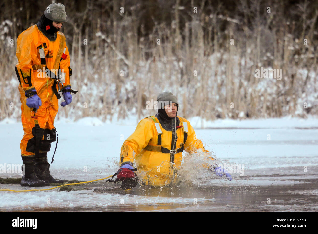 Airman 1st Class Anthony Wingfield, right, a firefighter assigned to ...