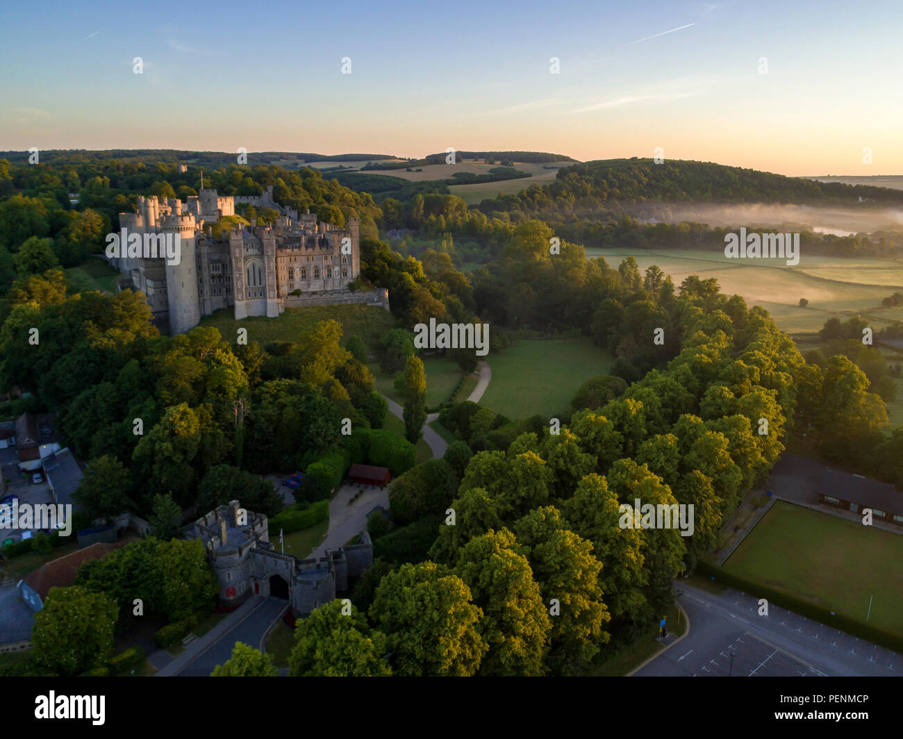 Drone image of Arundel Castle in the golden light of a summer dawn ...