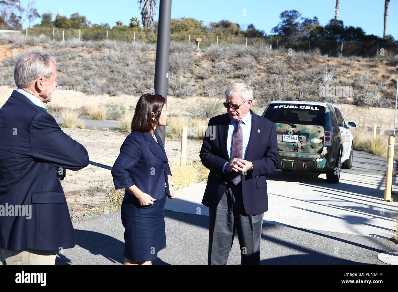 Ms. Christine Harada, Chief of Federal Sustainability Officer, center ...