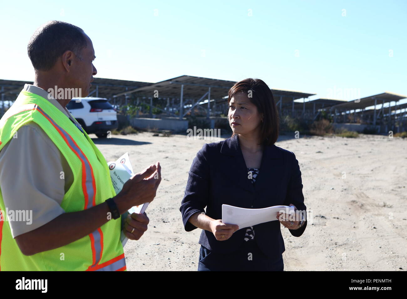 Ms. Christine Harada, Chief of Federal Sustainability Officer, right ...