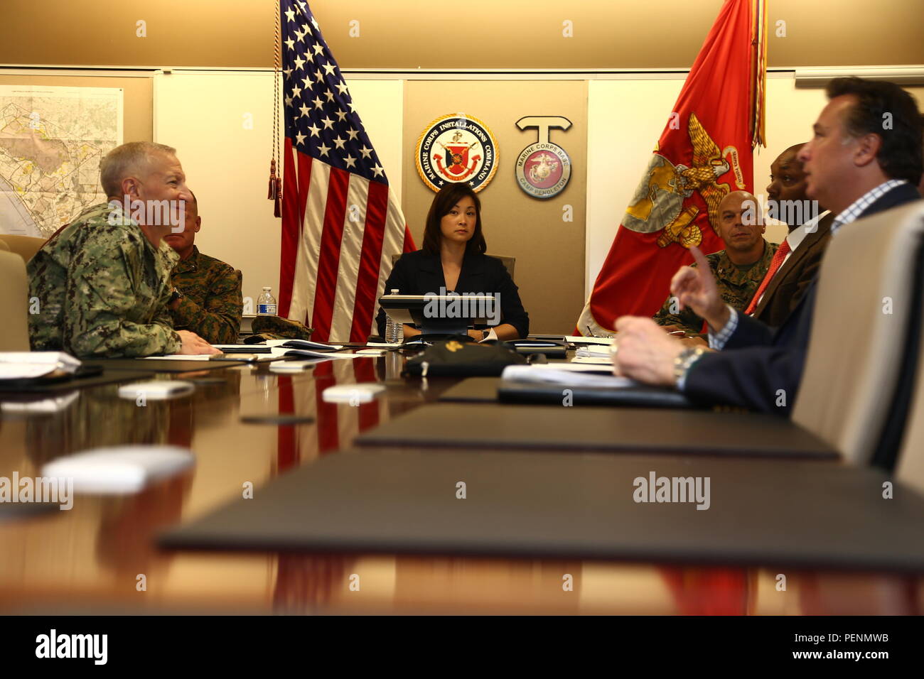 Ms. Christine Harada, Chief of Federal Sustainability Officer, listens ...