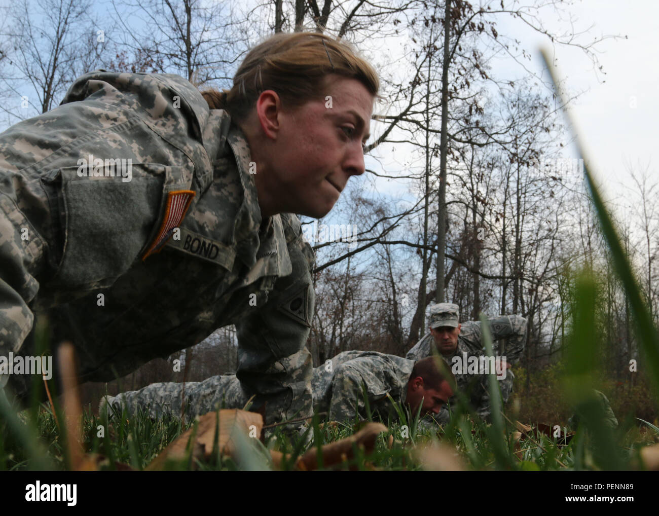 A CBRN specialist from the 637th Chemical Company performs push-ups ...