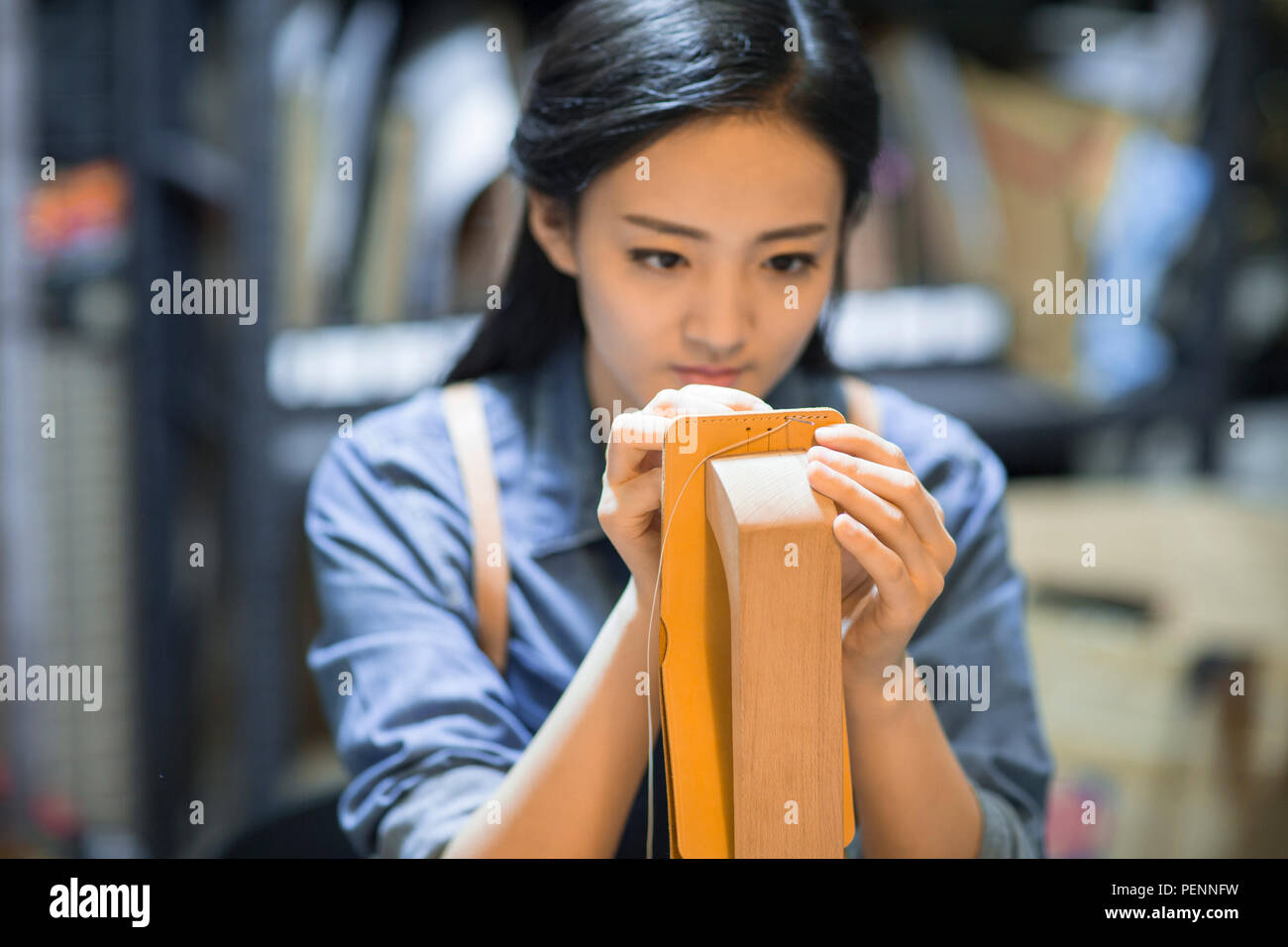 Craftswoman in sewing workshop hi-res stock photography and images - Alamy