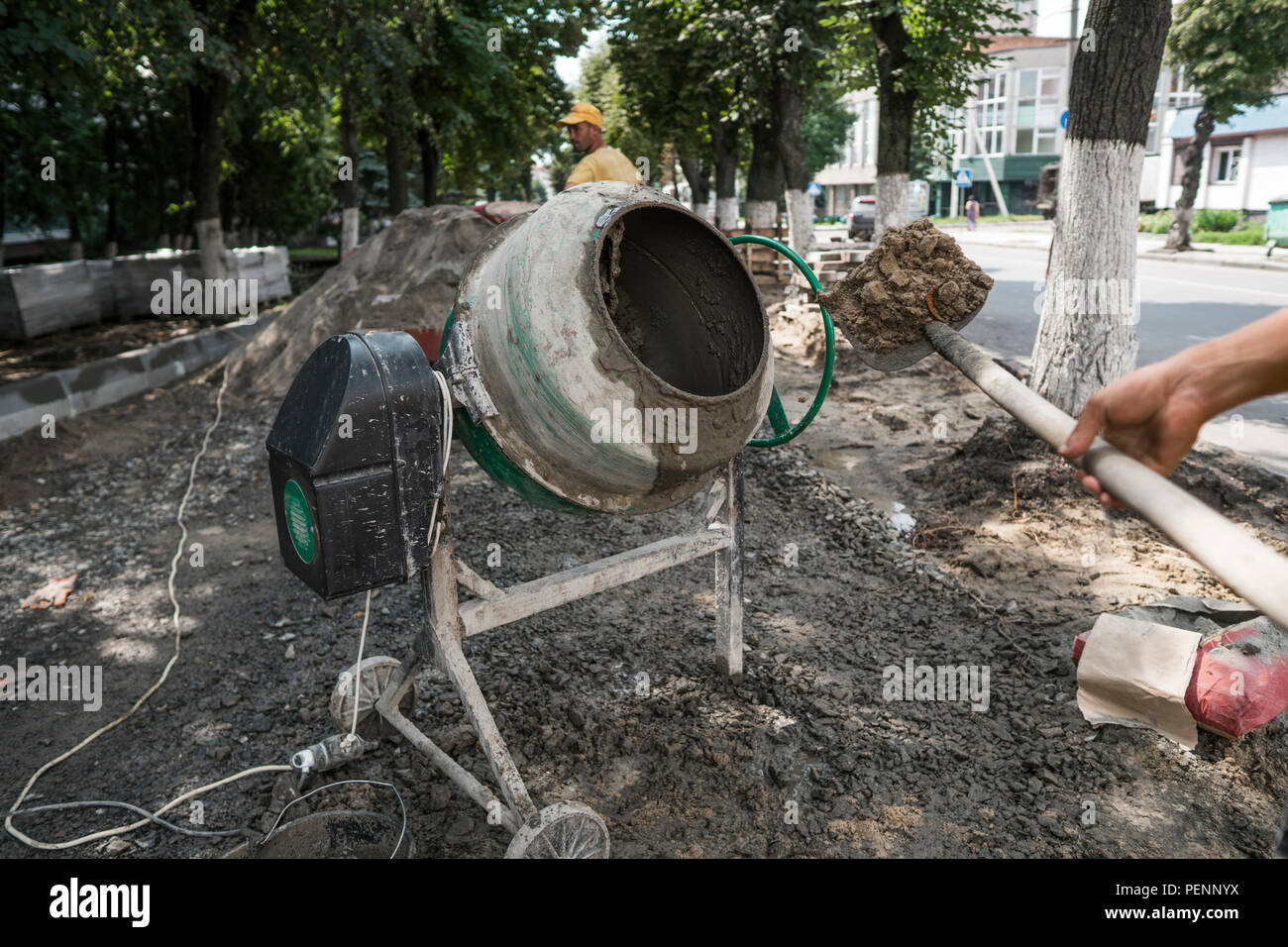 Hand mixing concrete shovel hi-res stock photography and images - Alamy