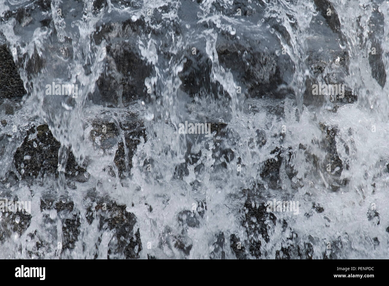 Abstract of water cascading down a fountain Stock Photo - Alamy