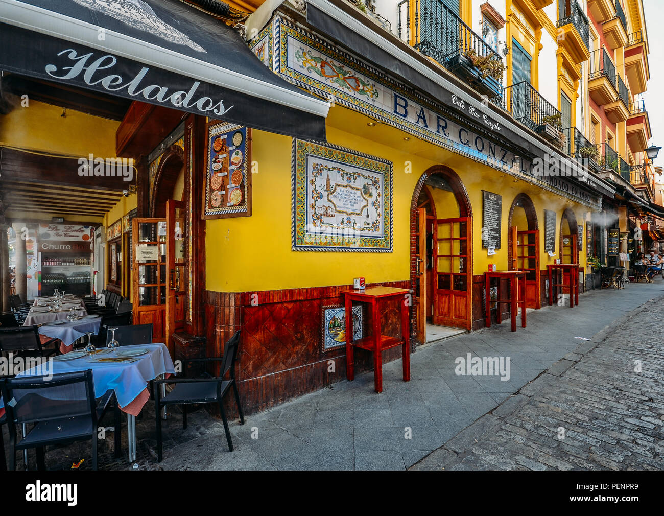 Seville, Spain - July 14th, 2018: Facade of traditional colourful tapas ...